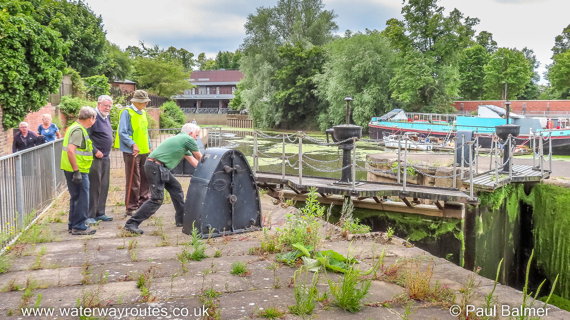 Opening the bottom gates on Castle Mills Lock - Waterway Routes